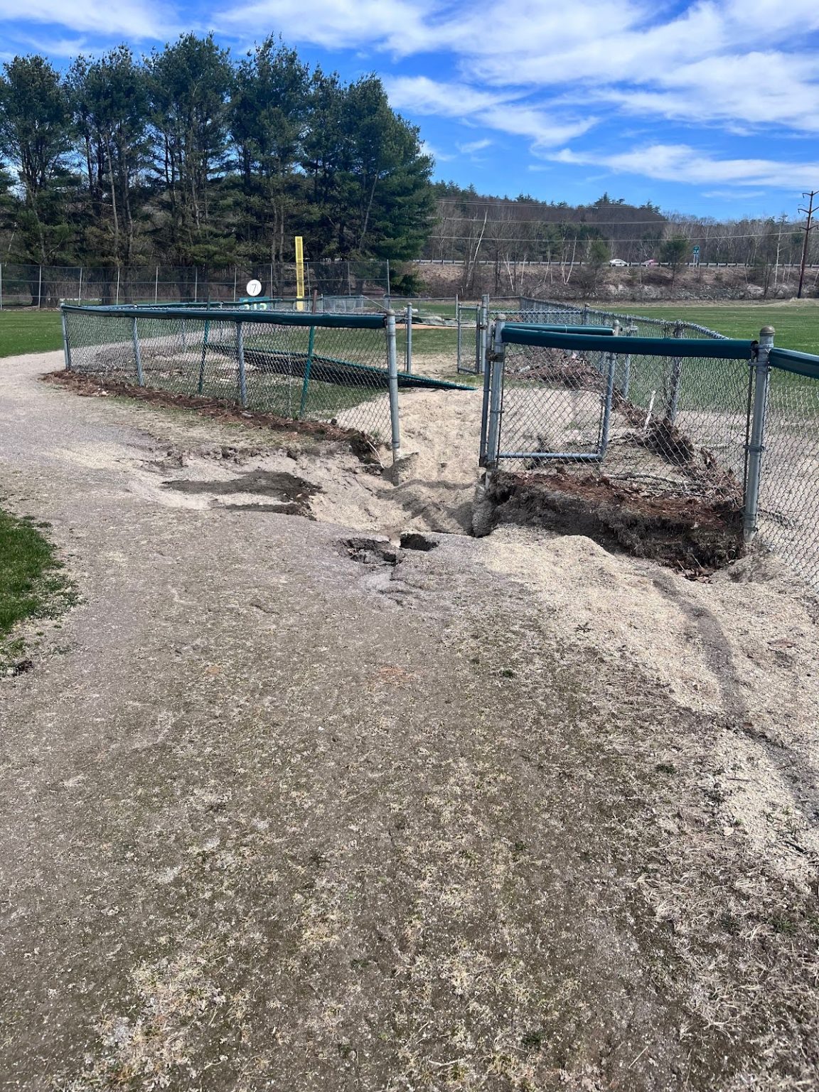 Baseball team plays on despite flooded home-field – The Clock